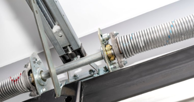 Torsion Springs Explained and Comparing Popular System Types | C & M ...